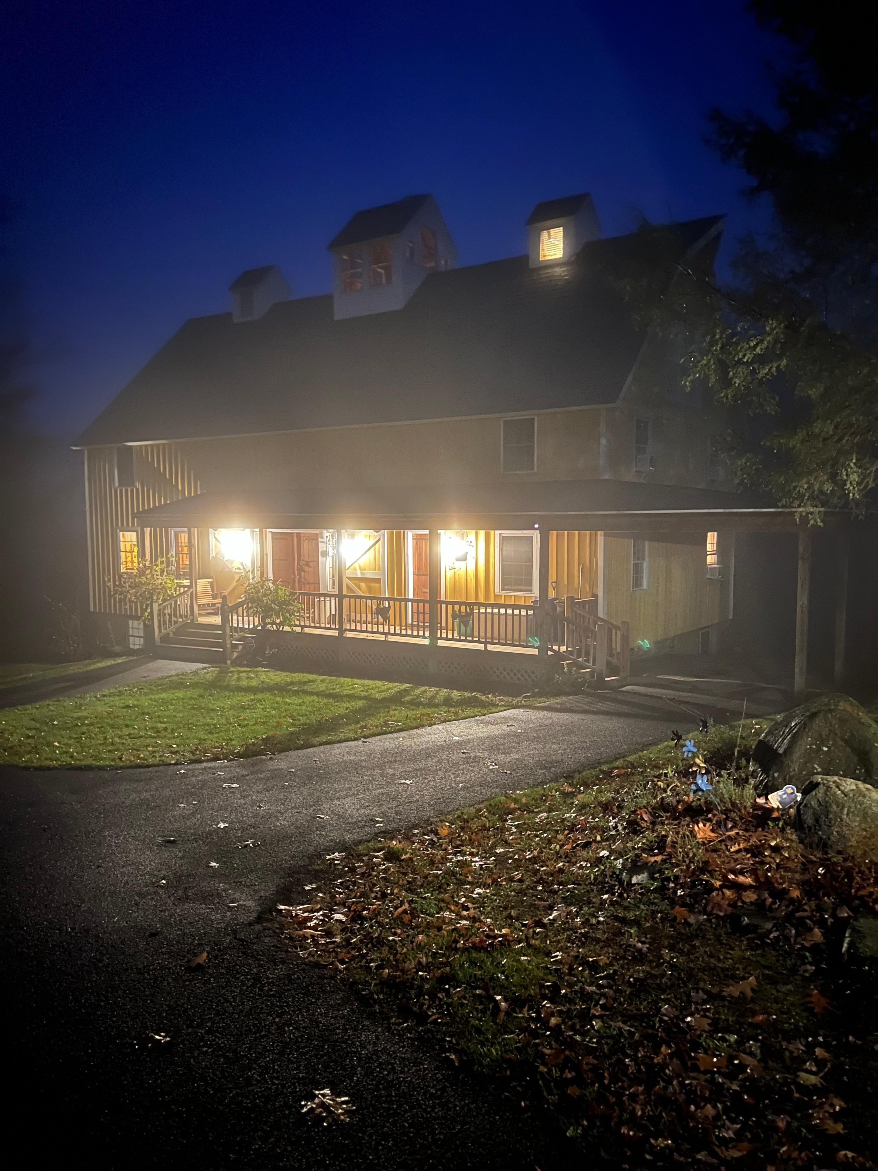 Outside, but it was very foggy and it started to snow when we were there.