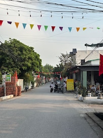 Street of bars, shops, restaurants. 5 min walk from hotel
