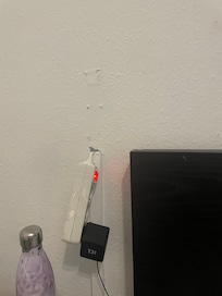 Power bar fallinf off wall