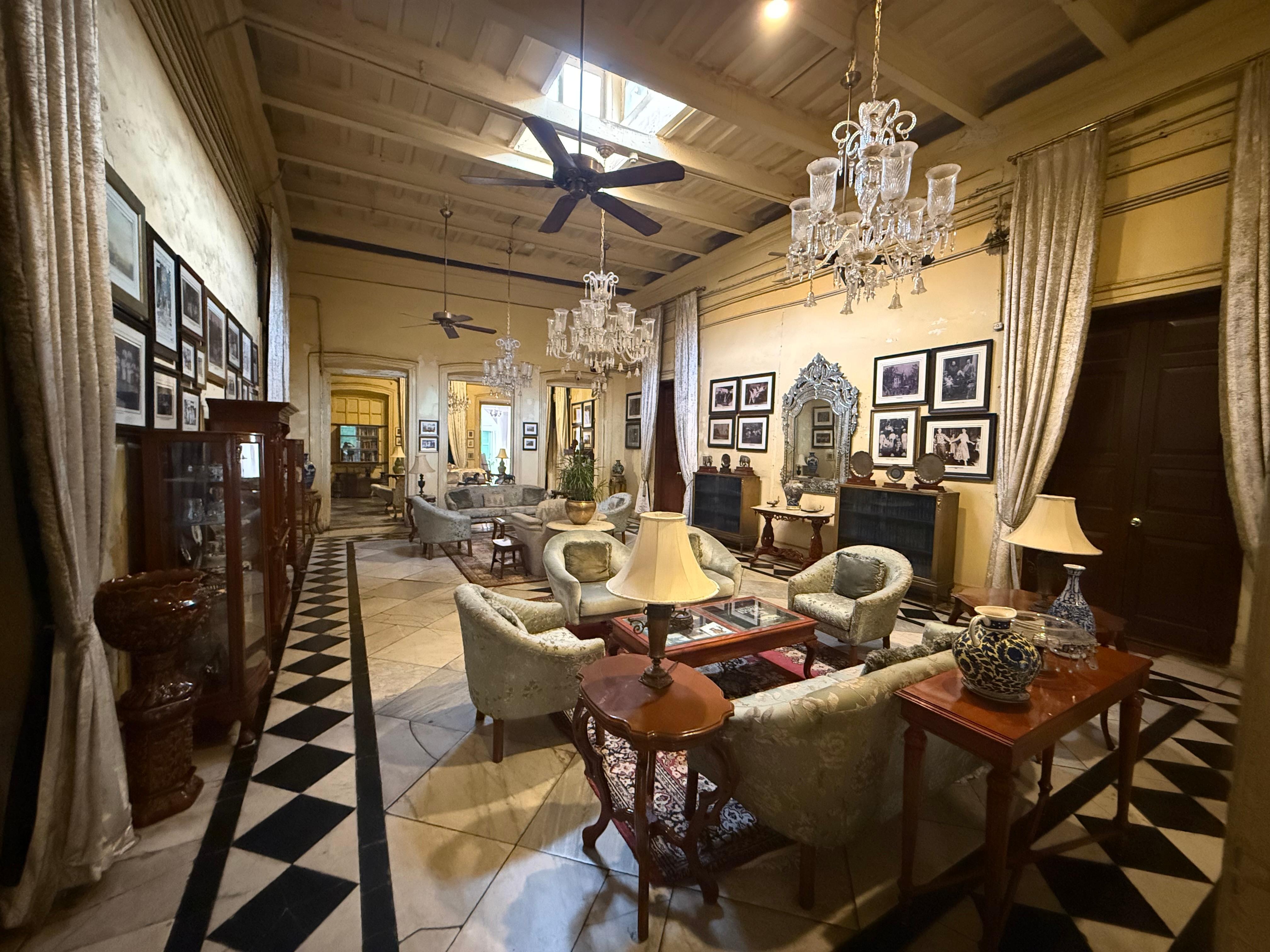 The sitting room with historical photos