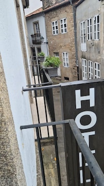 Varanda com vista para a rua