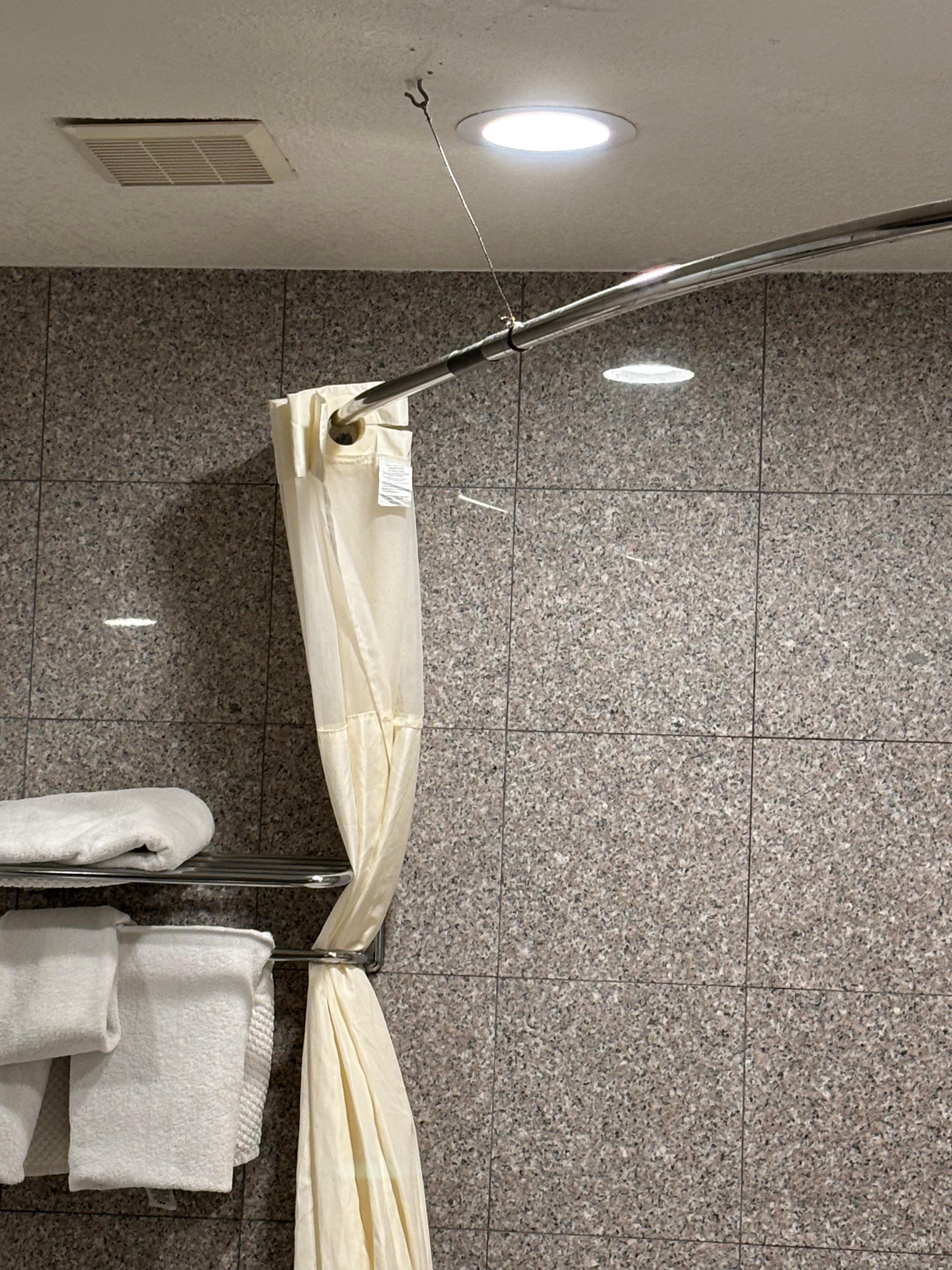 Curtain held up by string