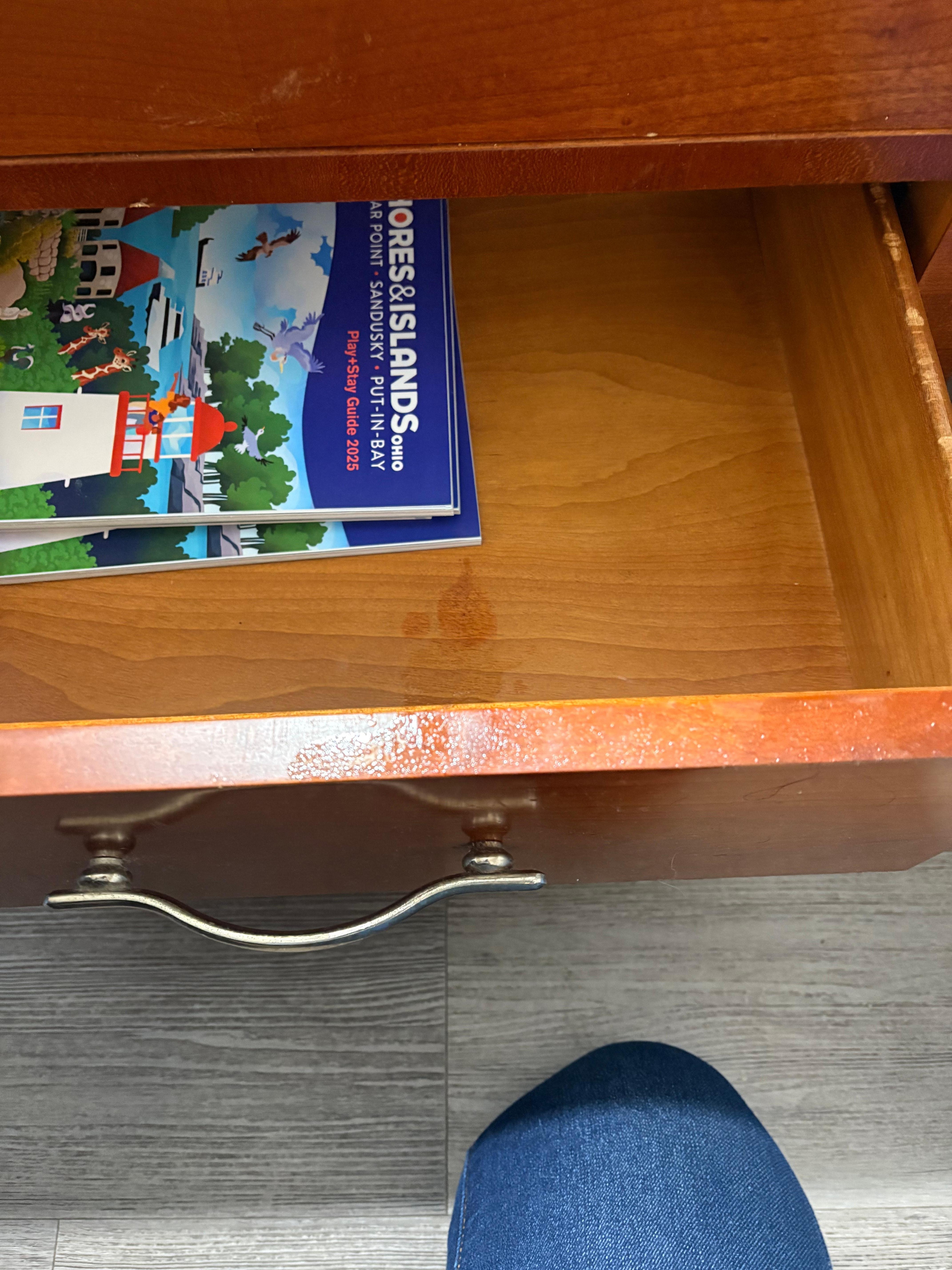 Something was spilled on this bedside table and never cleaned up.. 
gross! 