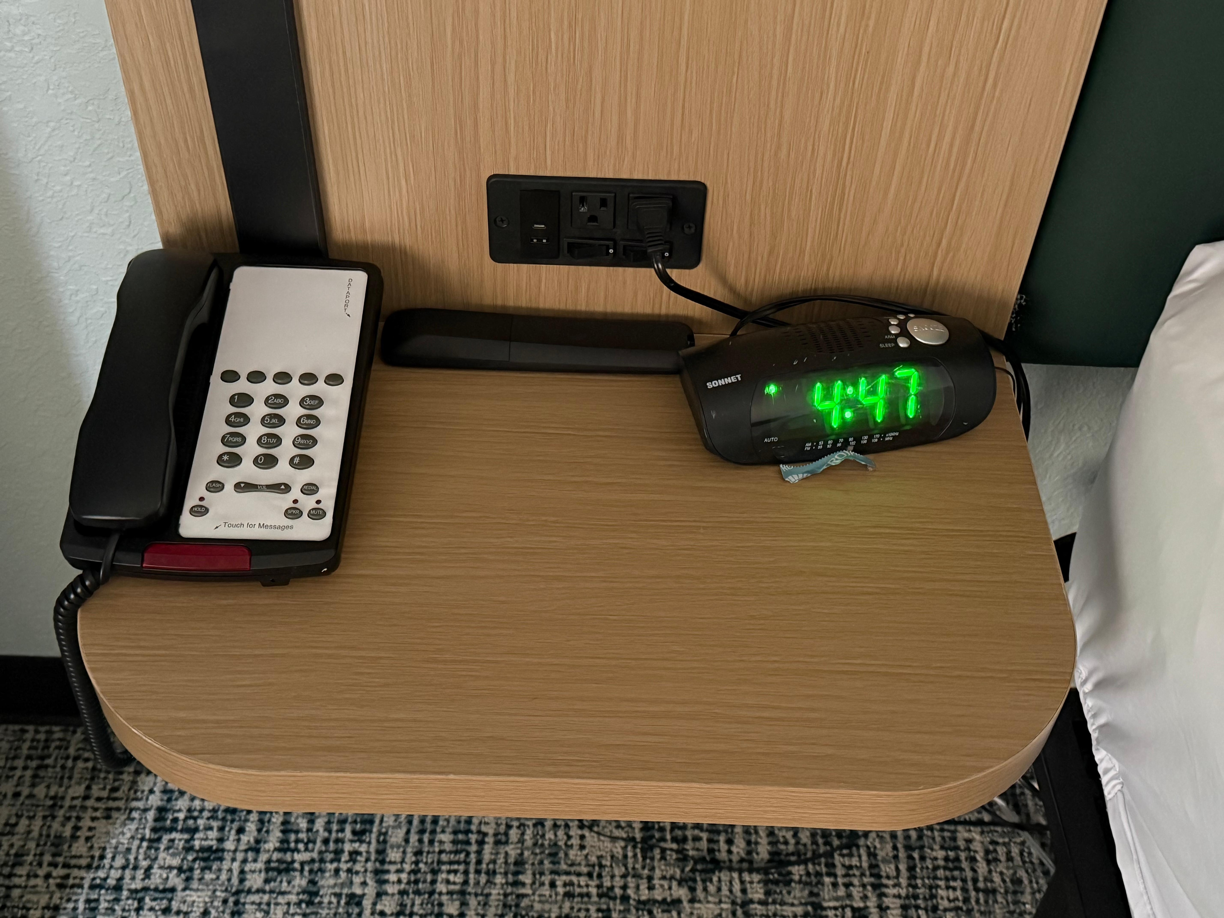 Side table in the first room. Room felt used. 