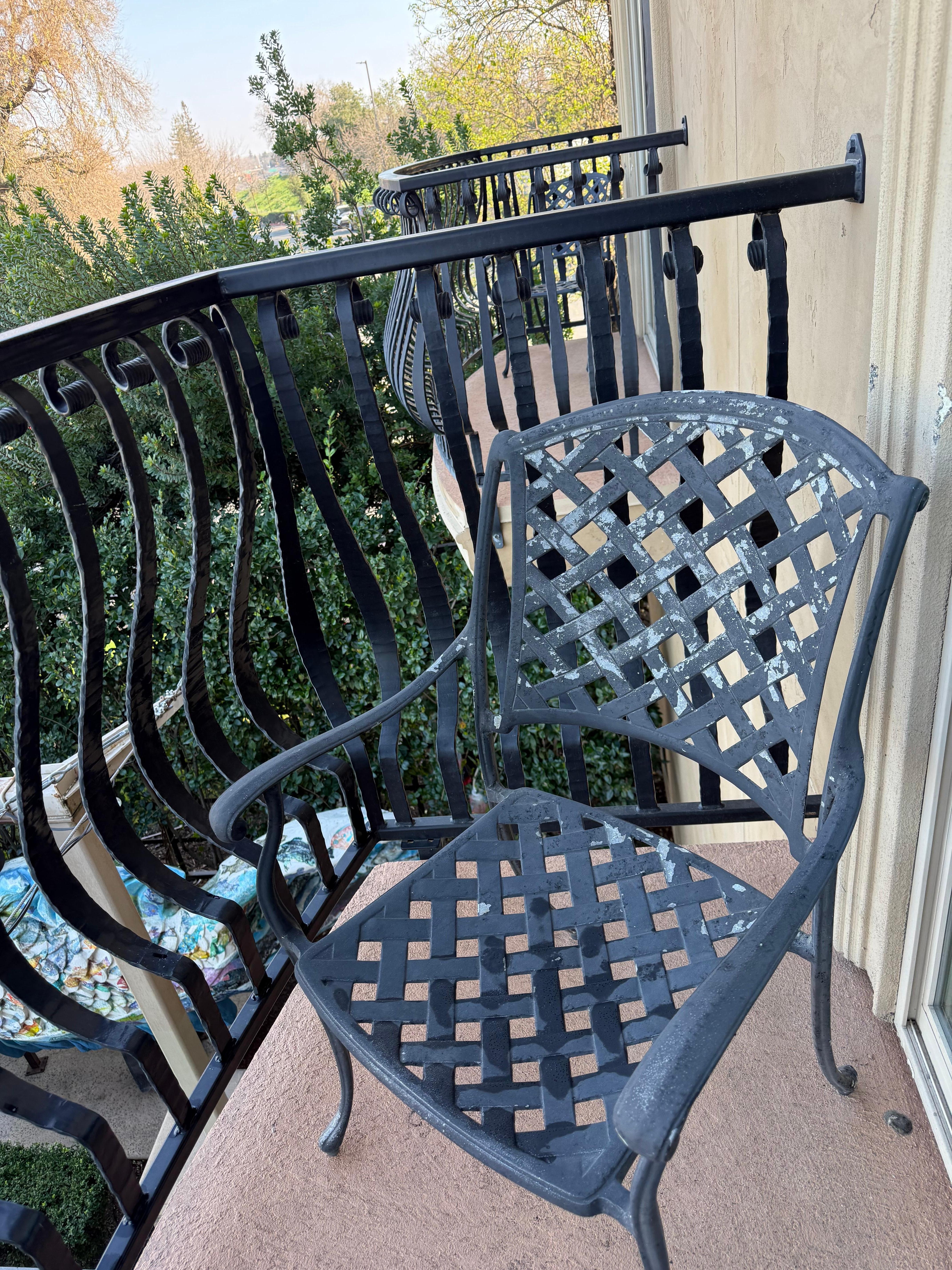 Outdoor furniture needs to be painted. Privacy on the balcony is an issue. 