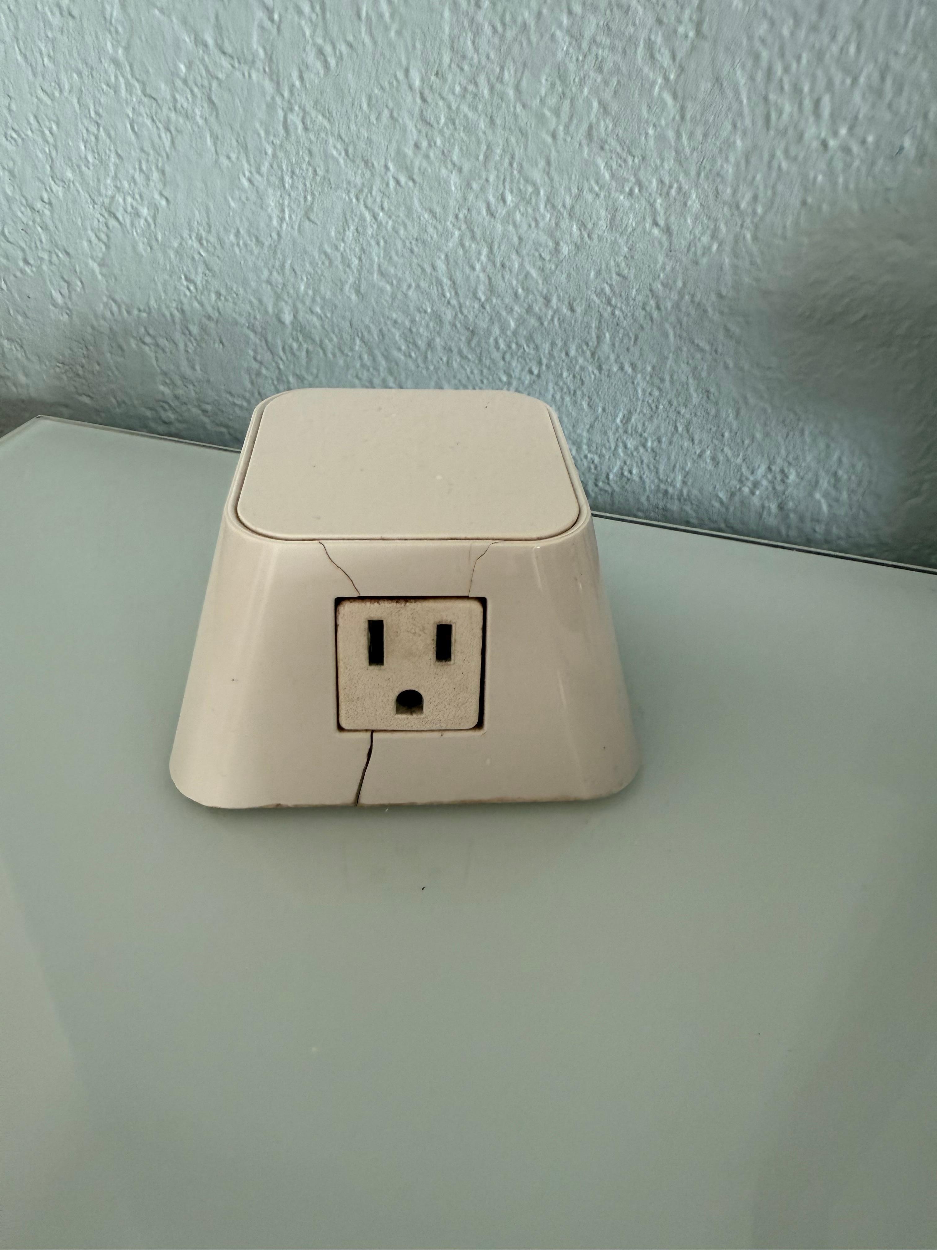 Plug on nightstand…cracked and possible safety hazard.