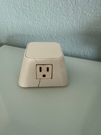 Plug on nightstand…cracked and possible safety hazard.