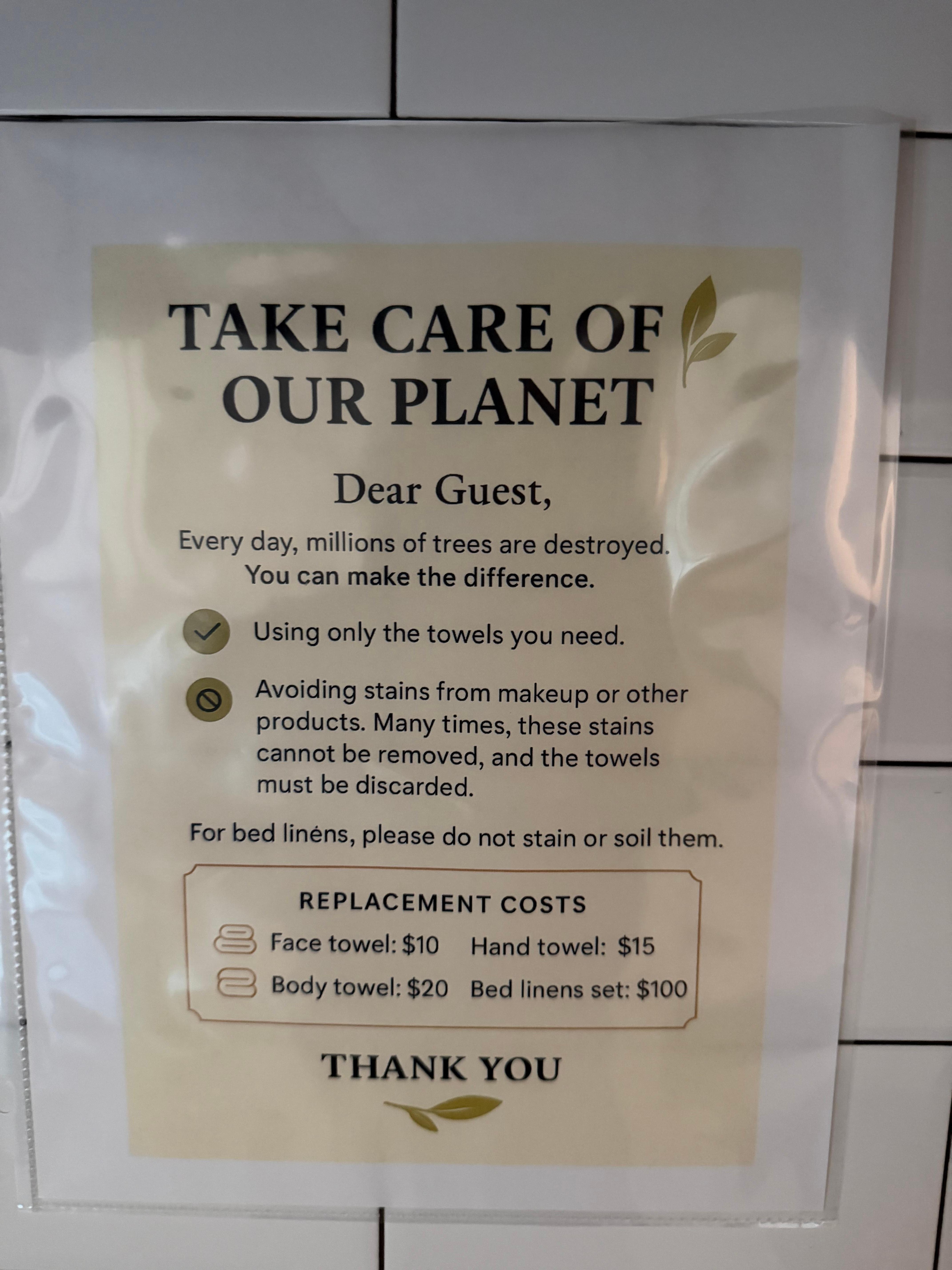 The strange Cash Grab logic of "save the trees by keeping my towels clean". Plus a handy price list they can gouge you for. Nothing says "Hospitality" than a ransom note.