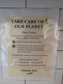 The strange Cash Grab logic of "save the trees by keeping my towels clean". Plus a handy price list they can gouge you for. Nothing says "Hospitality" than a ransom note.