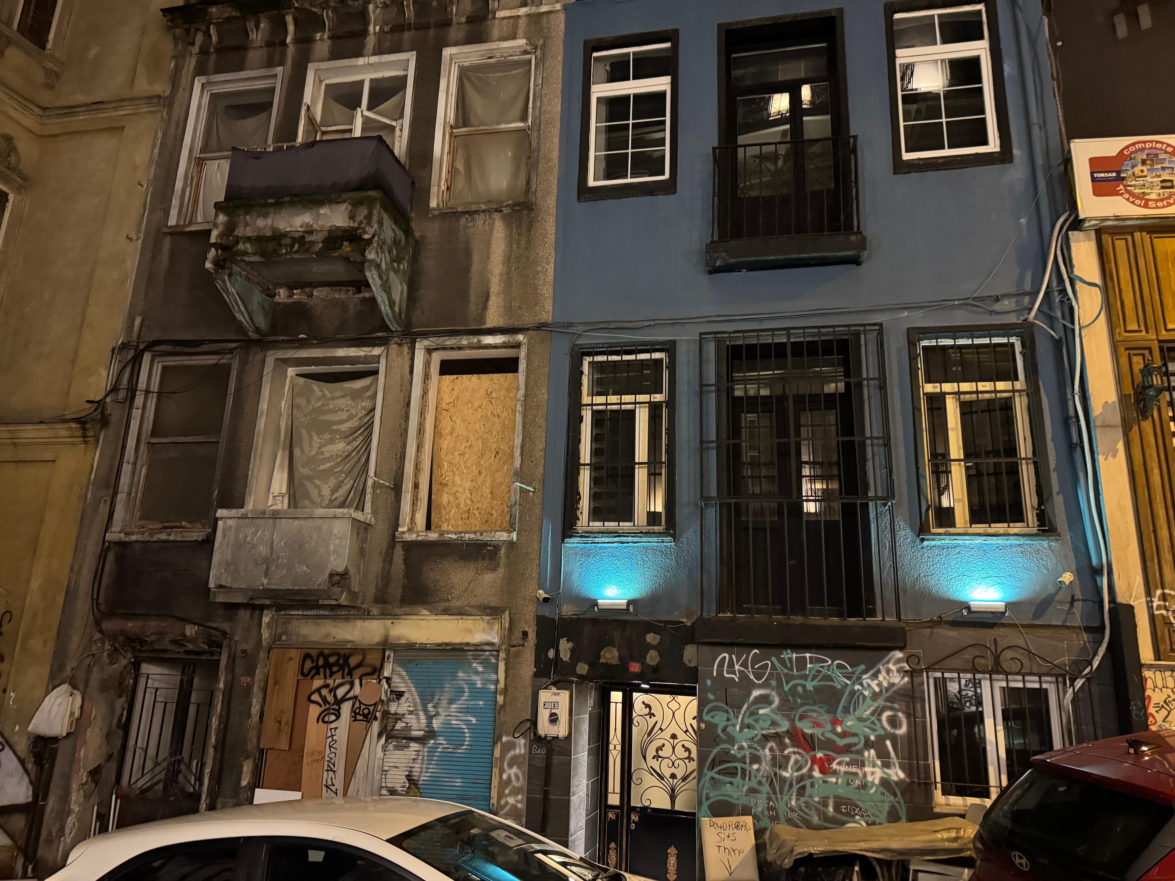 Standing next to the ruins 