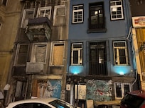 Standing next to the ruins