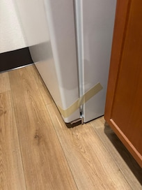 Bottom of refrigerator taped shut