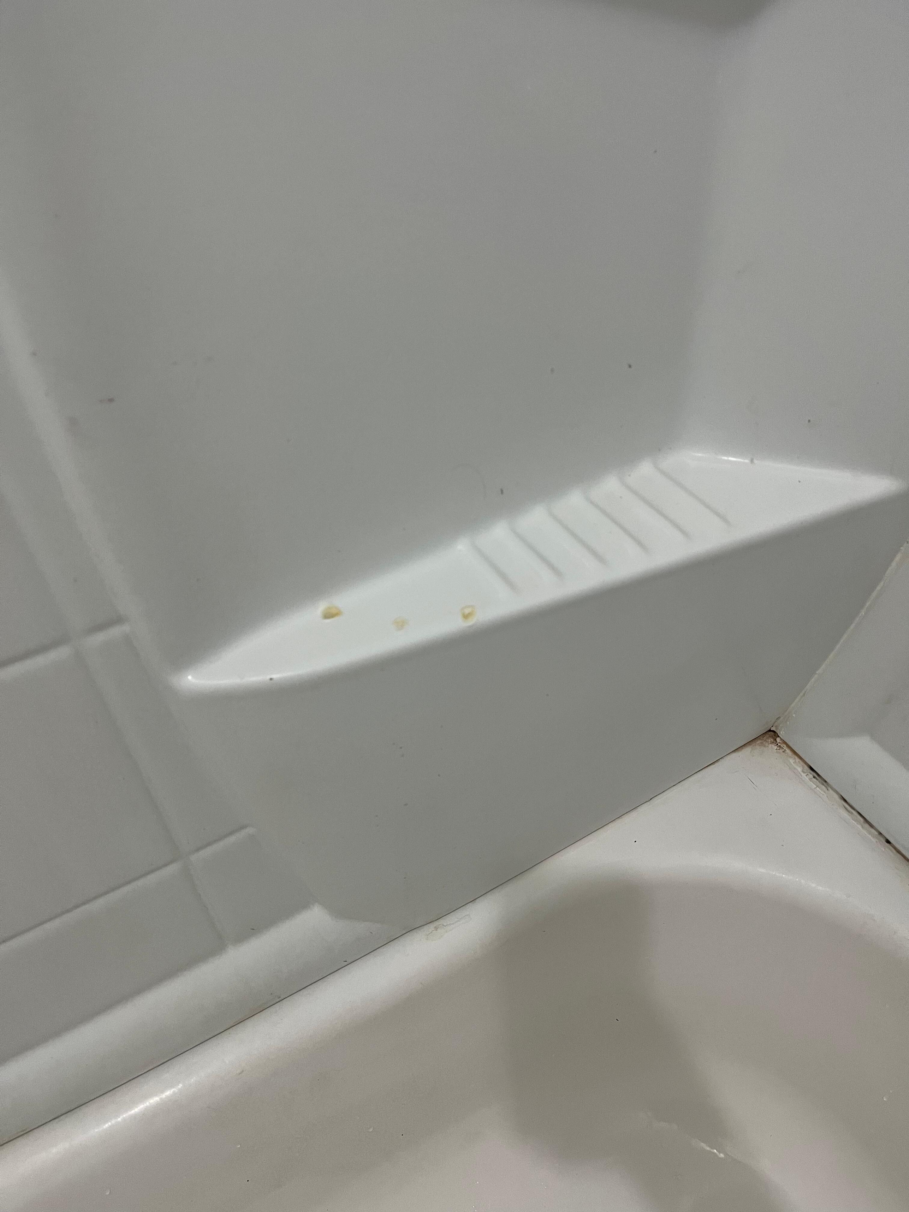 Cigarette burn in shower