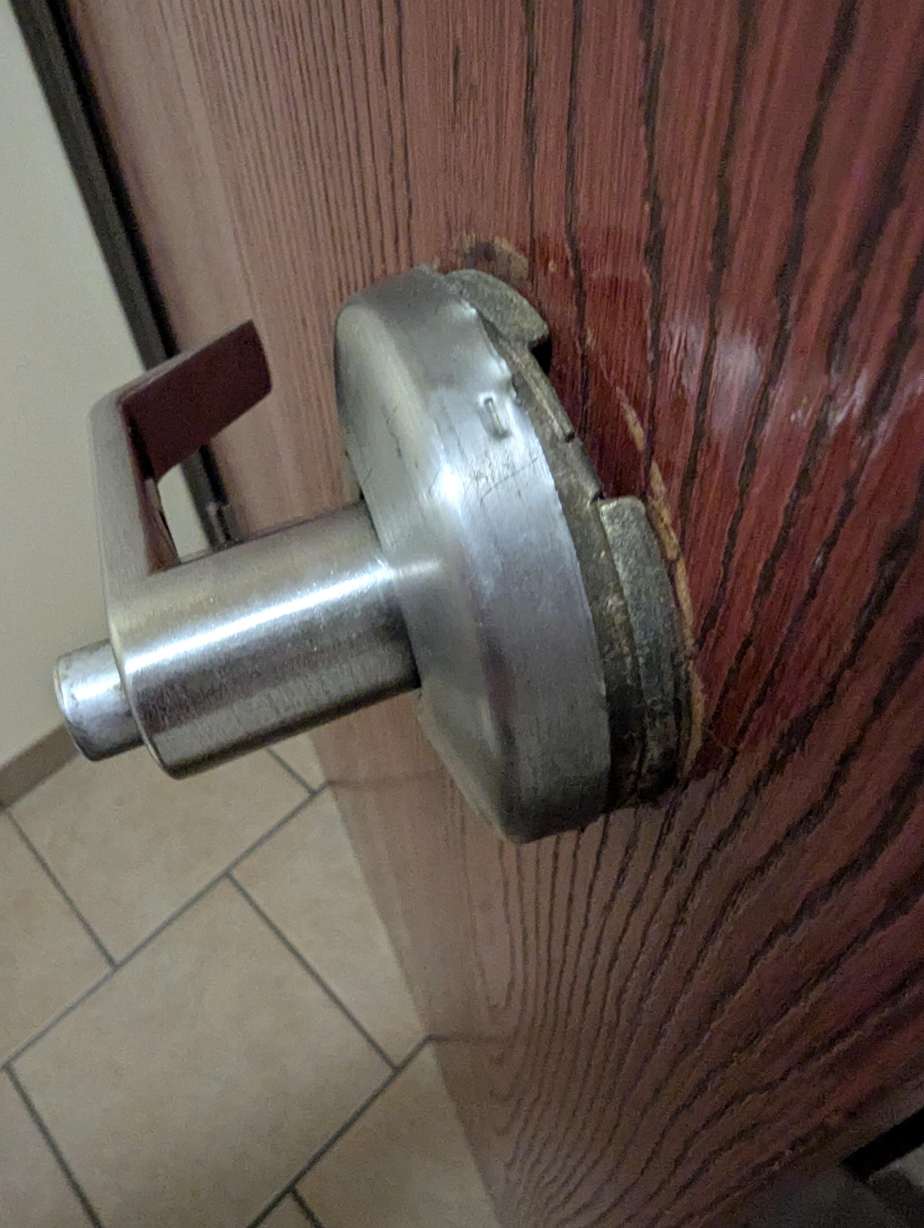 Bathroom Dorr Handle falling off and looked like several fixes have been done. Why not put on a new one!