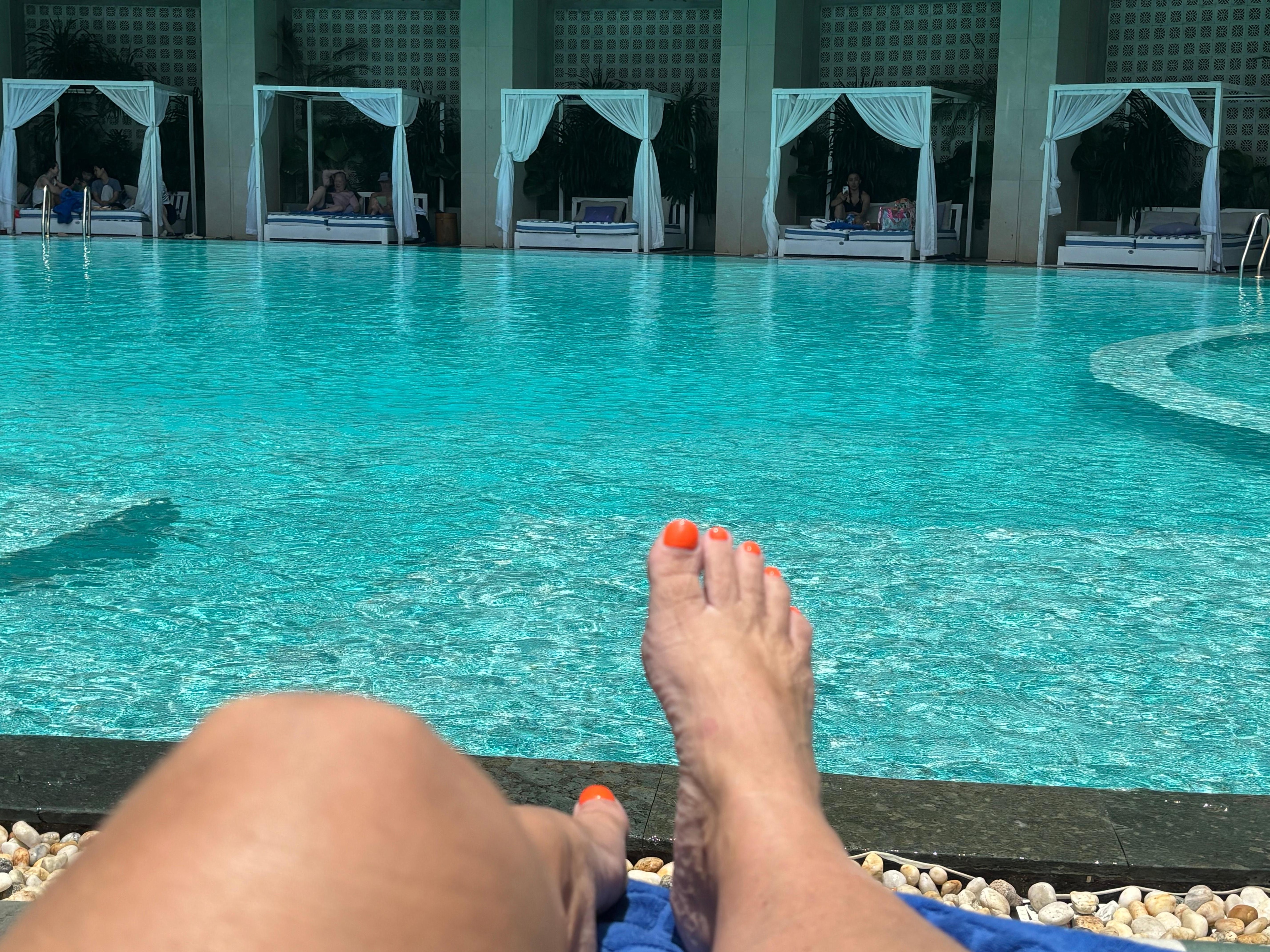Poolside - plenty of lounges and cabanas