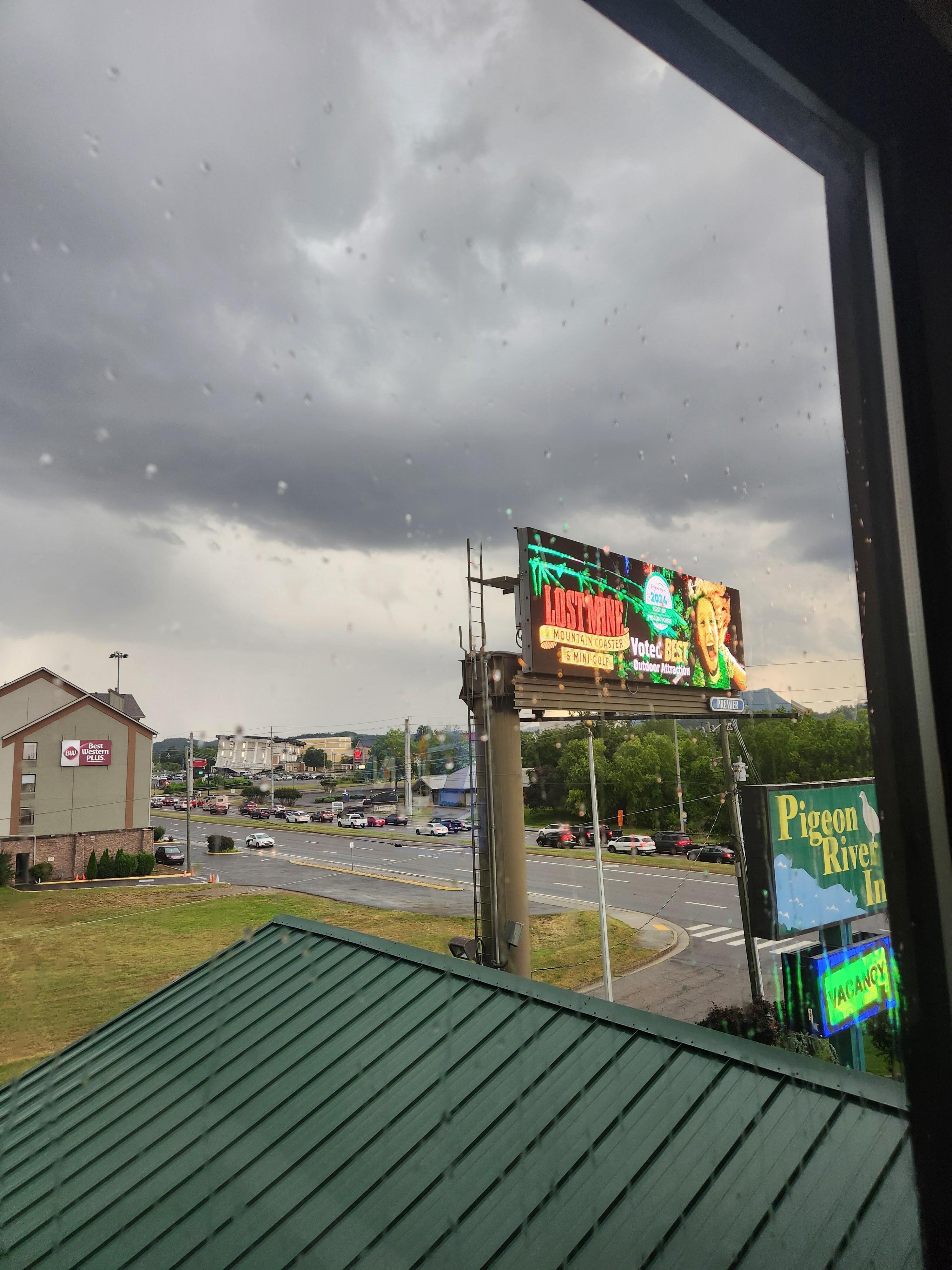 Electronic billboard outside and view of strip. Quiet inside room even if busy outside. Shades in room hide light well. 
