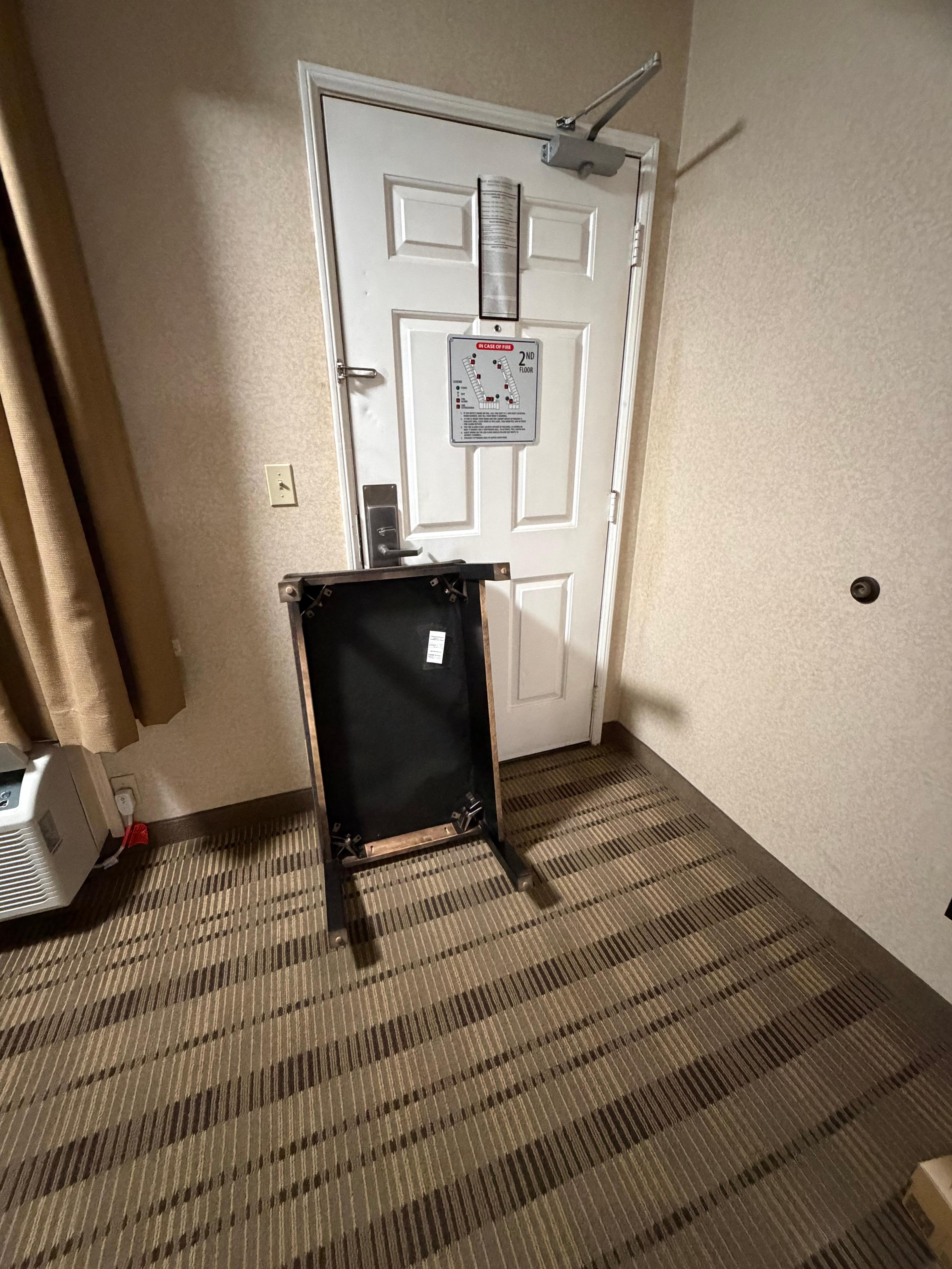 We put the little bench up underneath the door handle to feel safe