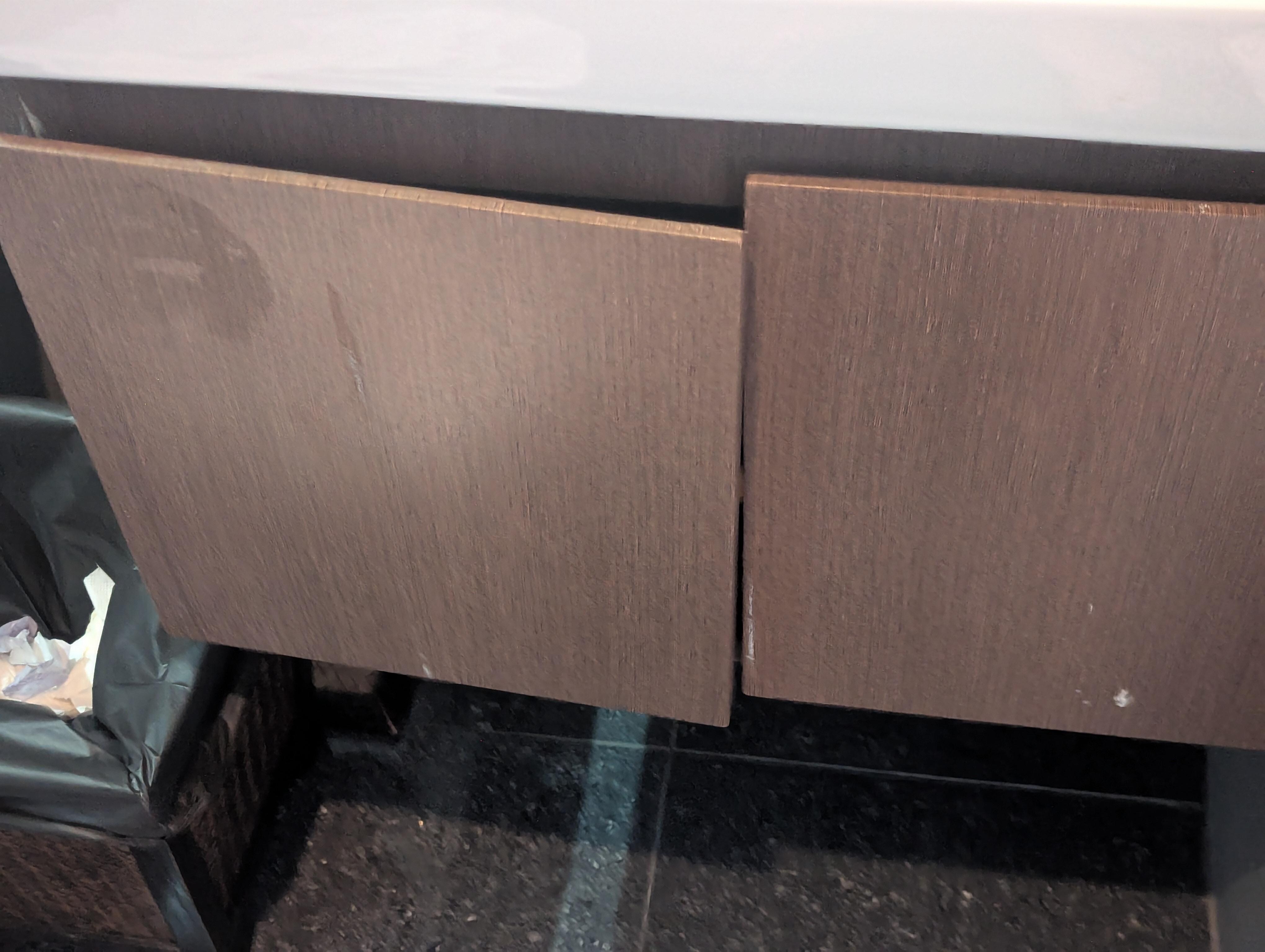 Cupboard doors hanging off 