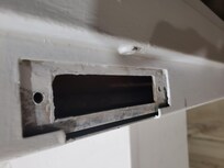 No door strike plate,. Bathroom door doesn't latch closed.