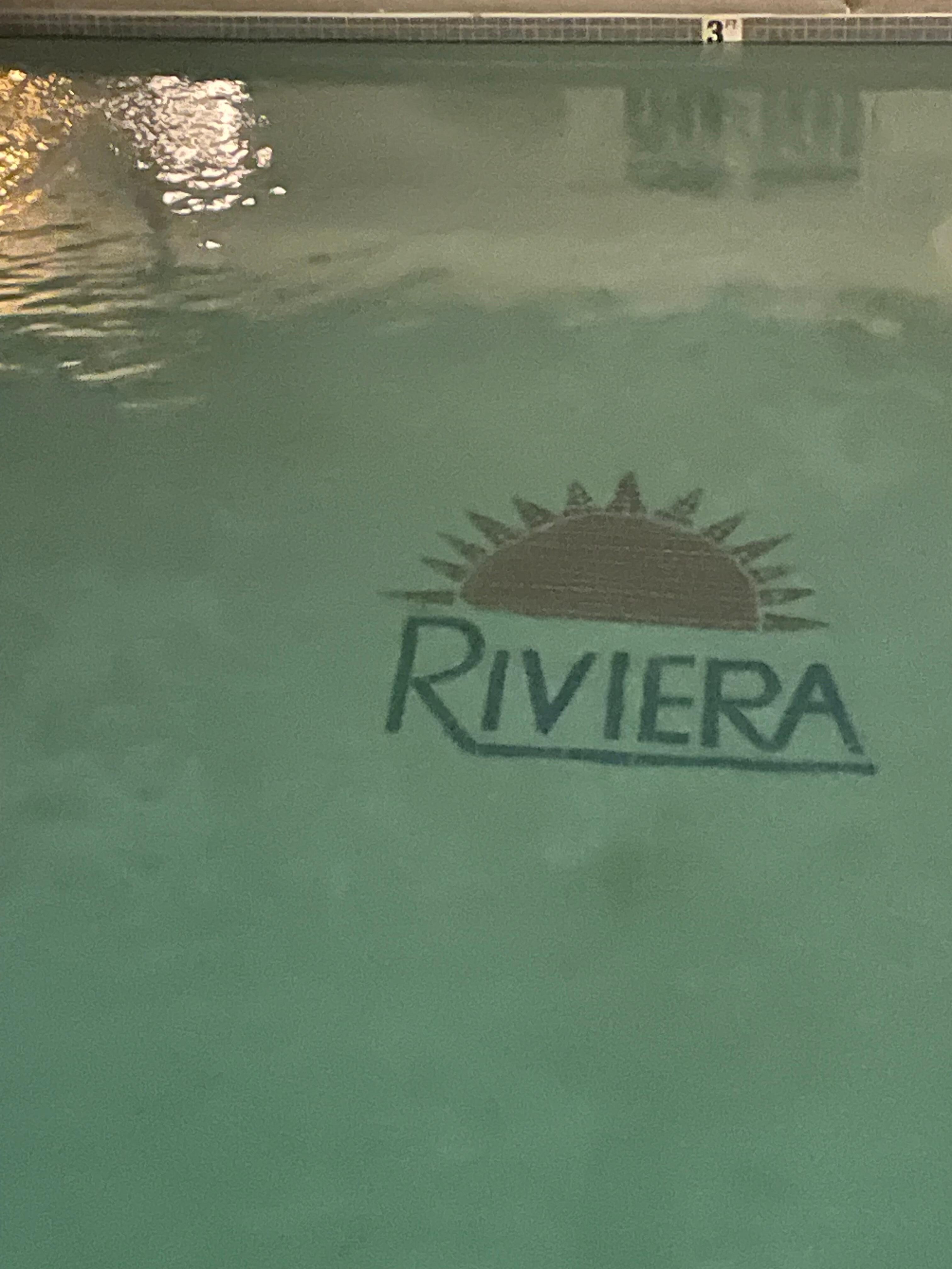  Clean pool area with lounge chairs 