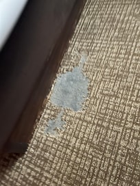 Teppich vor dem Bett