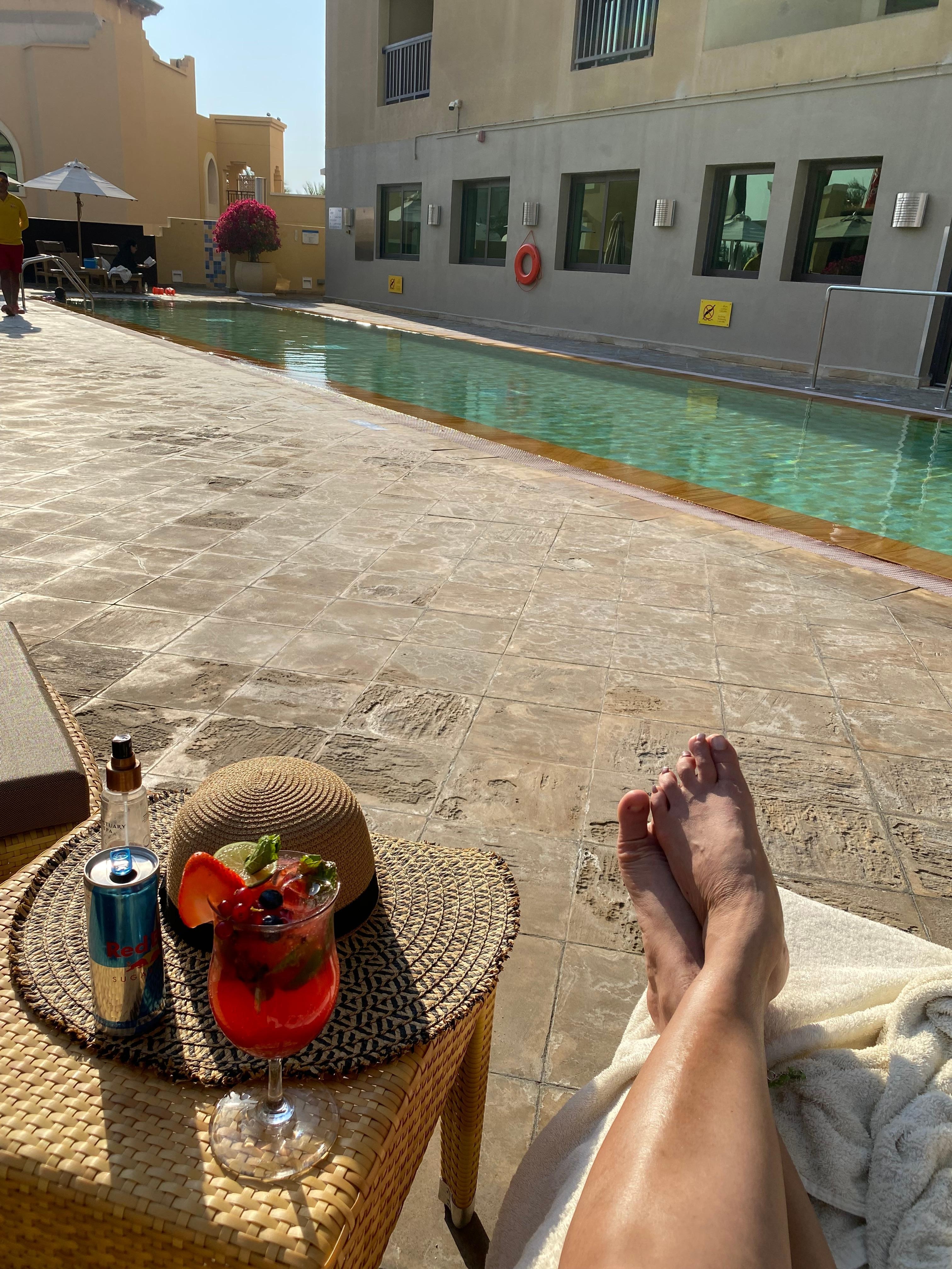 Relaxed by the pool