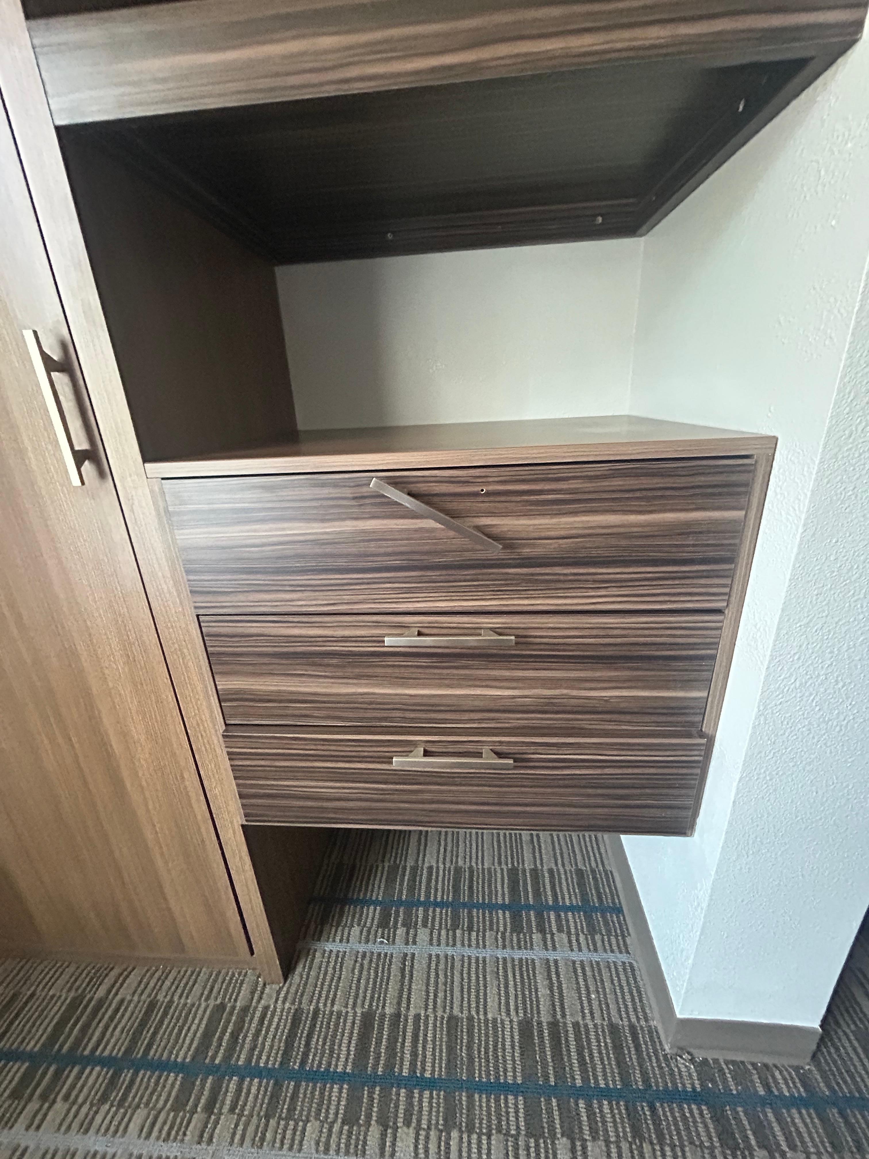 A broken handle on the dresser