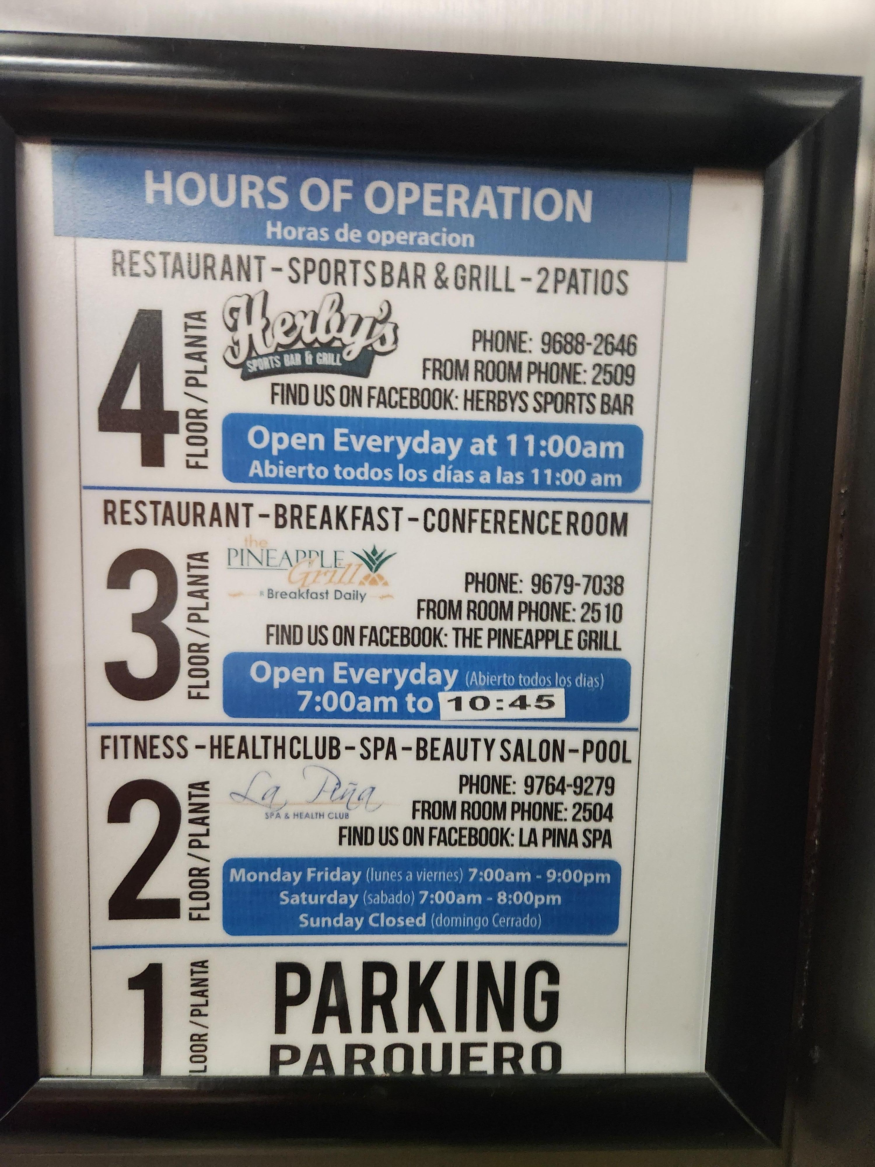 Operating hours posted inside elevator