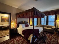 Big room, working fireplace and jetted tub!