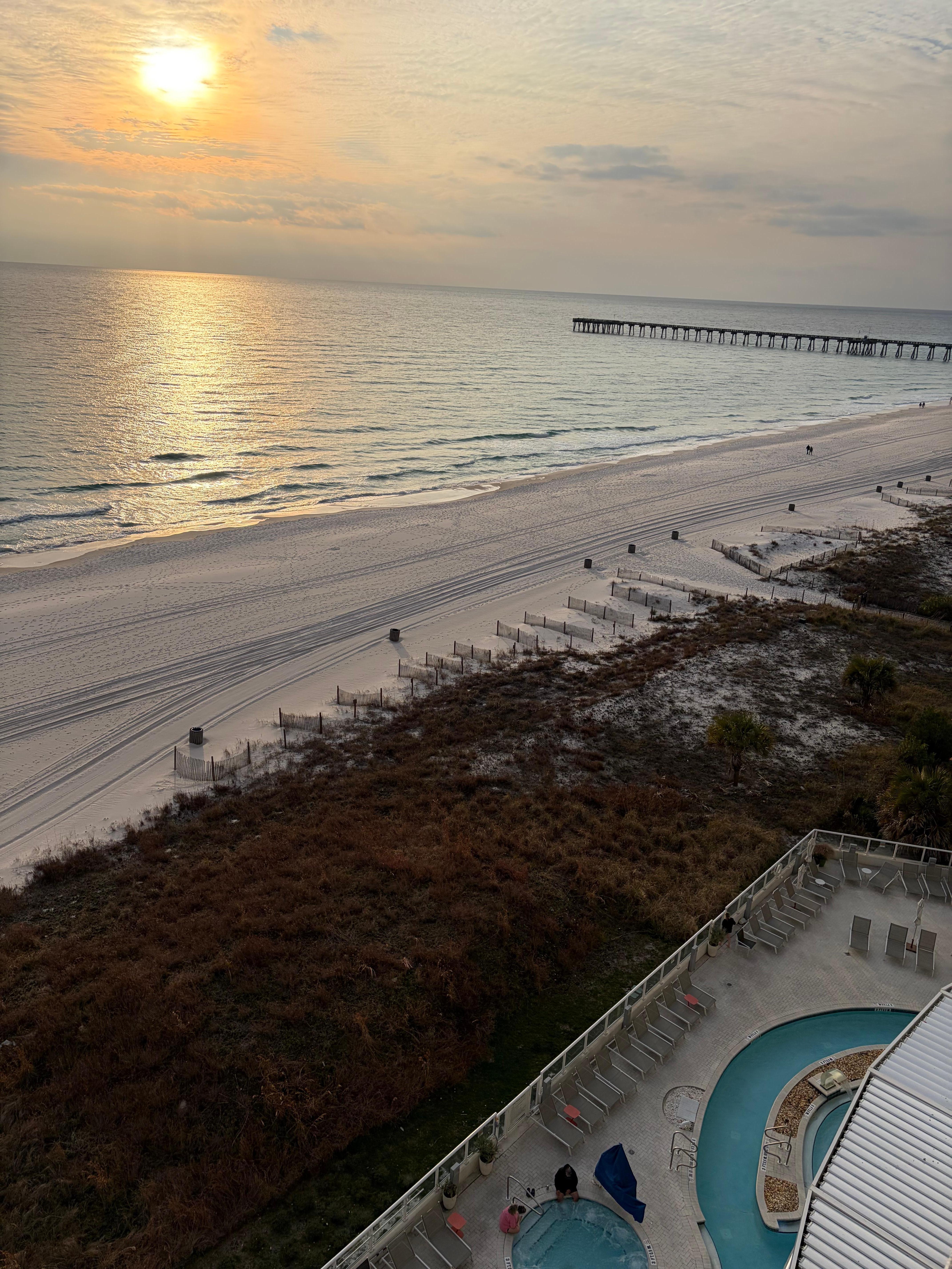 Sandy beach, warm hot tub and nice pool. 