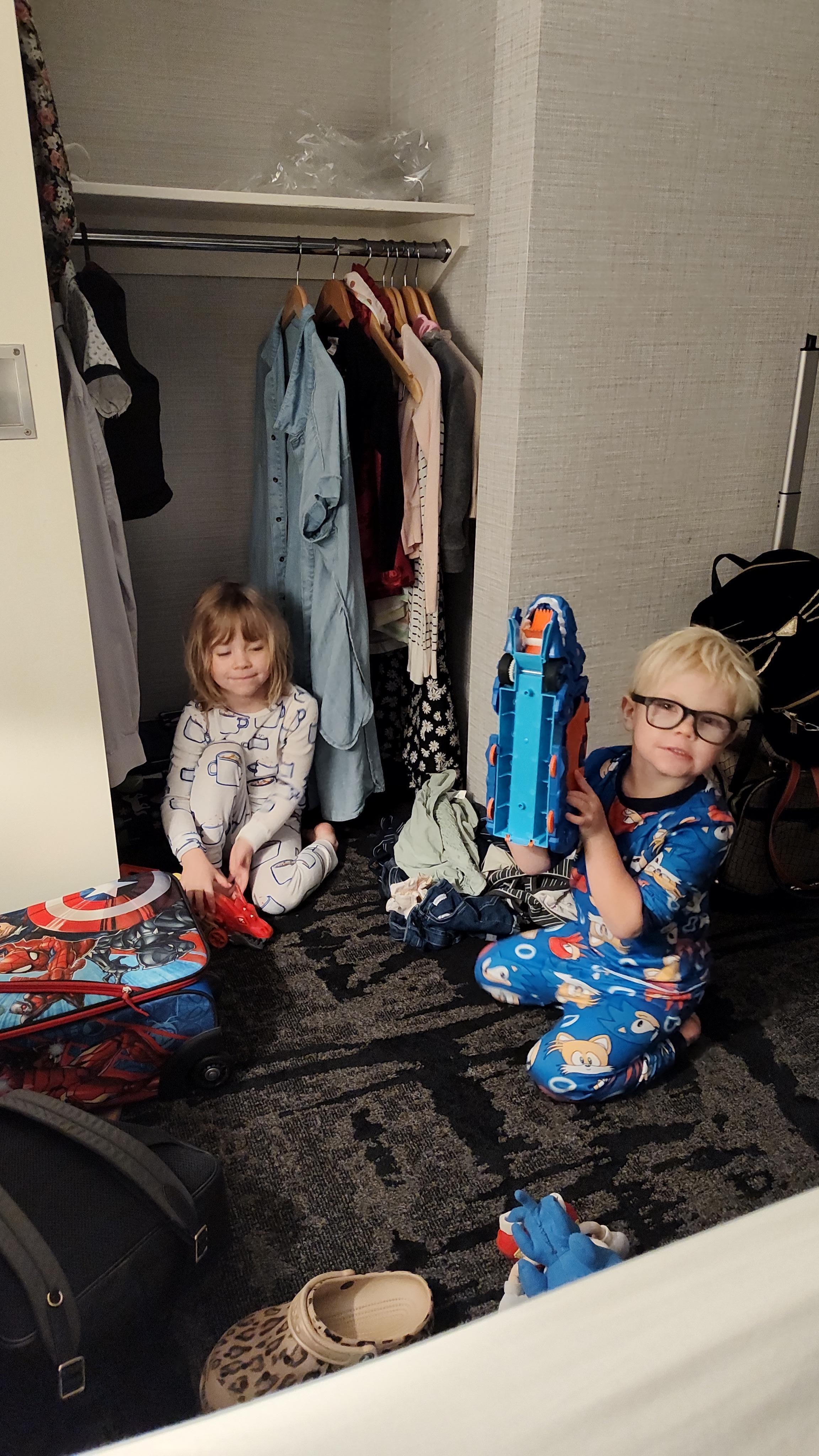 Playing airport in the closet. Having so much fun!! Just before bed. After baths. 