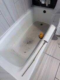 Shower was clogged made mess all over bathroom