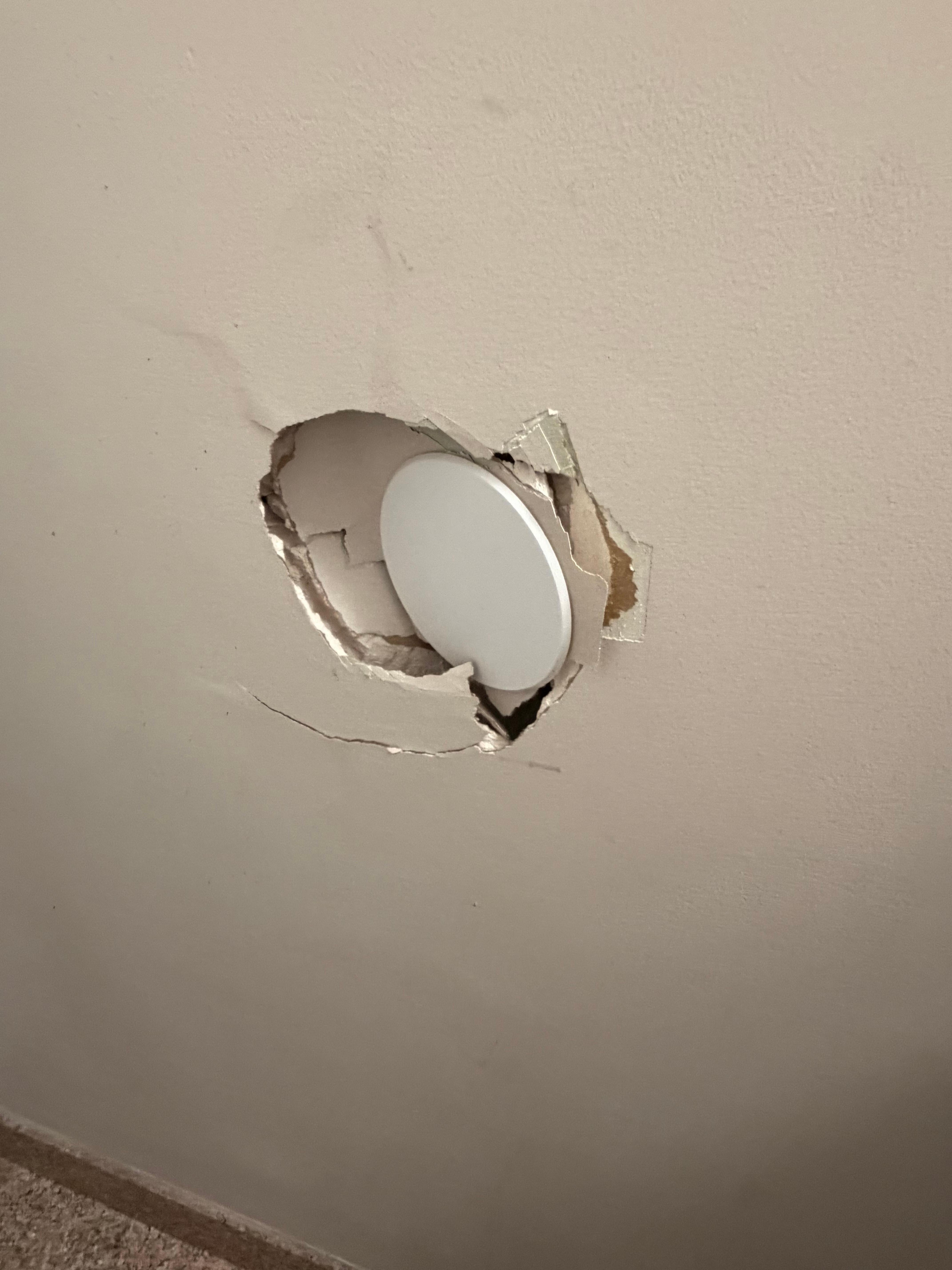 Hole in bathroom wall