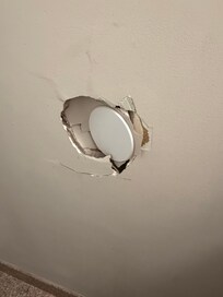 Hole in bathroom wall
