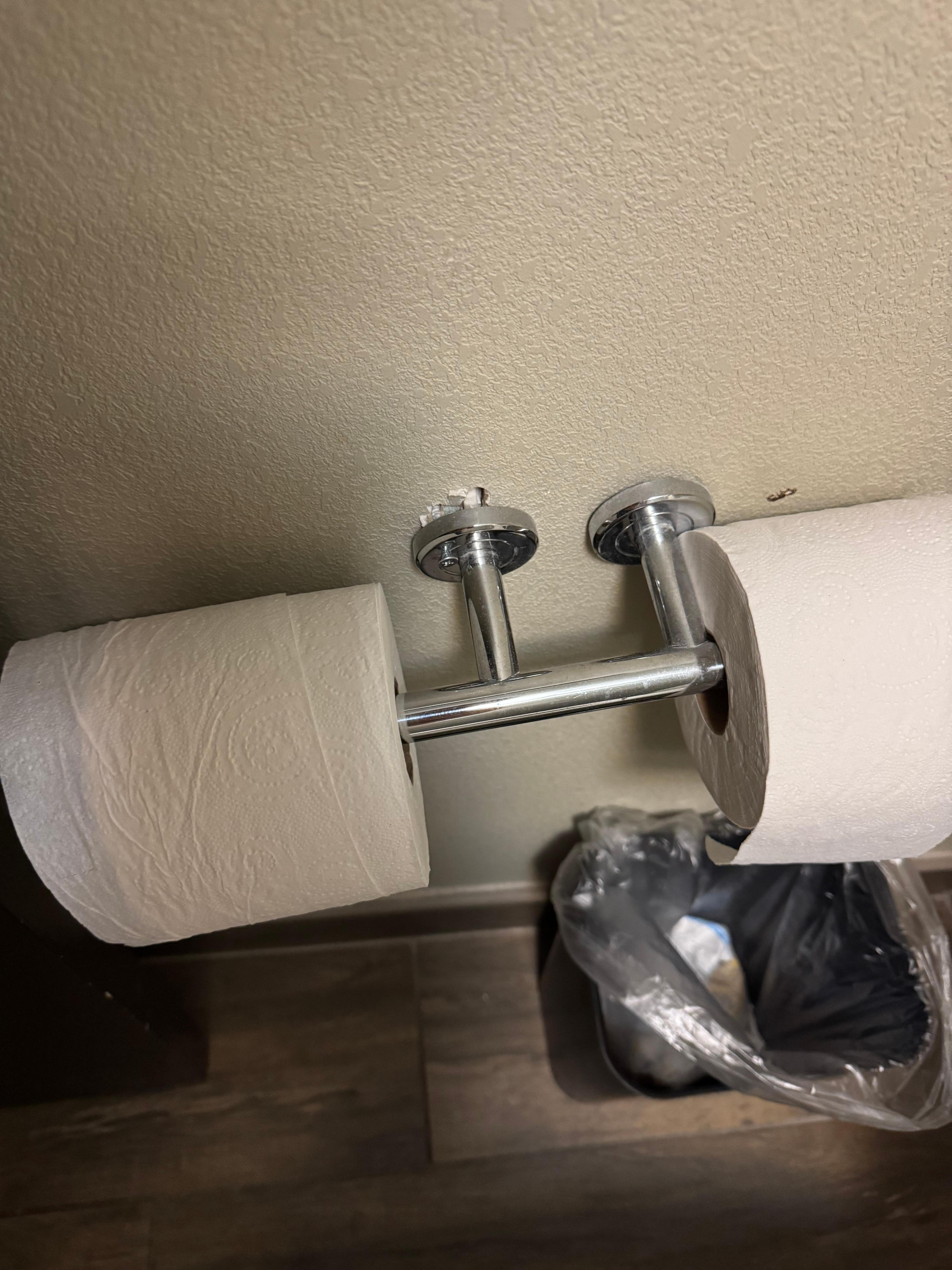 Toilet paper holder coming out of the wall