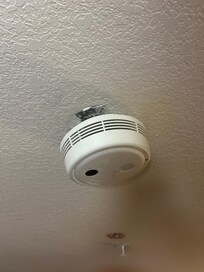 Hanging and broken fire detector