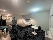 Spacious room. Lights were a little bright, no lamps only ceiling lights.