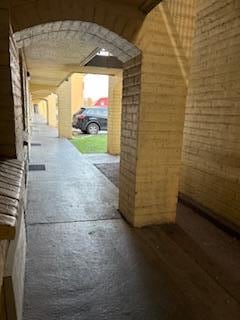 Photo taken during the day.  NO lights at night, very dark and scary passage way