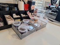 Jelly, butter, peanut butter, syrup, cream cheese etc all pre portioned in 2 oz cups with lids. Kinda gross.