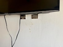 Dirty under the TV