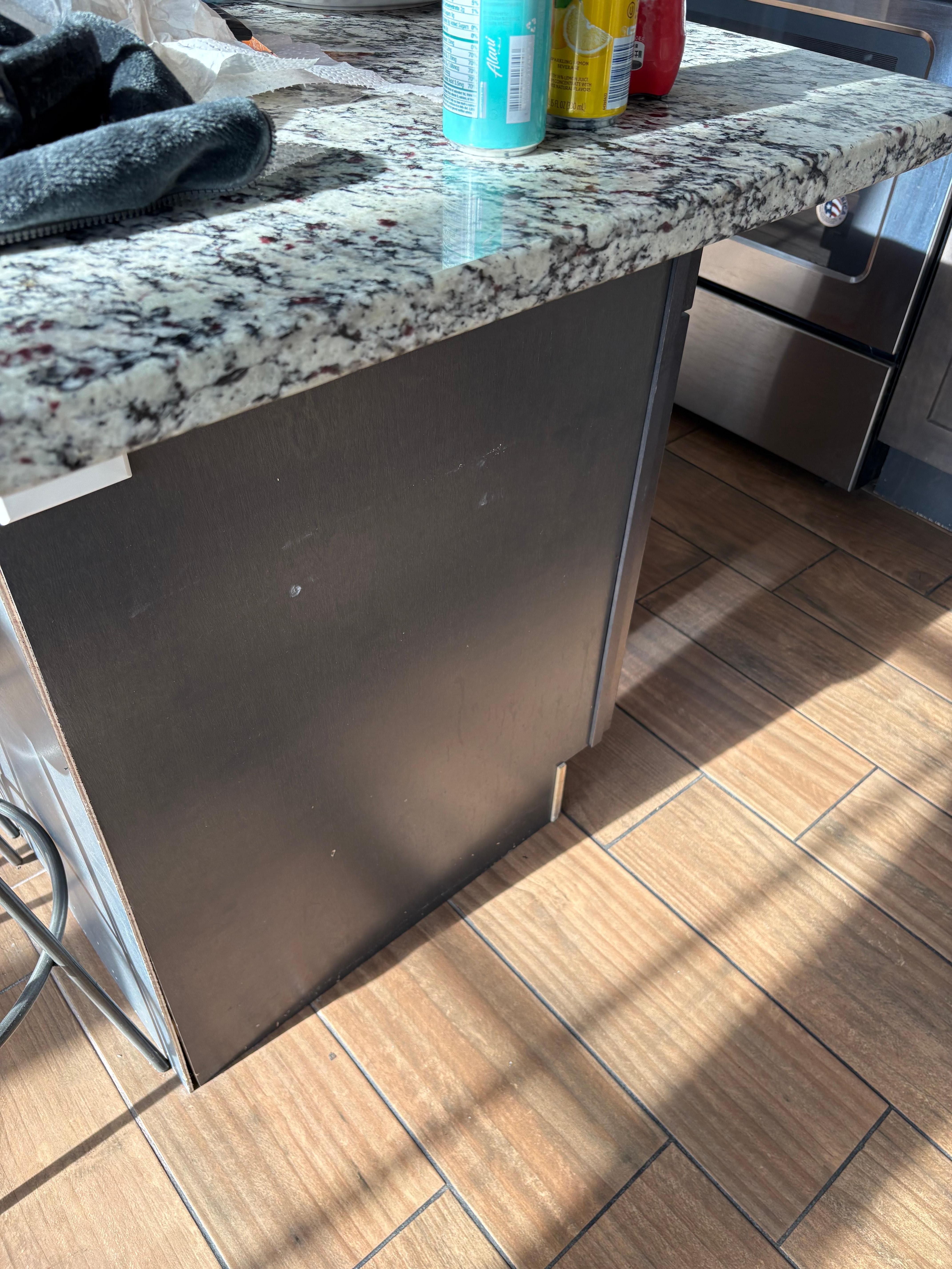 More scuffing on the kitchen island- if you look closely on the left hand side you’ll see that the boards of the island are popping apart.