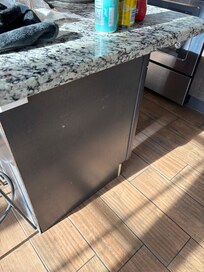 More scuffing on the kitchen island- if you look closely on the left hand side you’ll see that the boards of the island are popping apart.