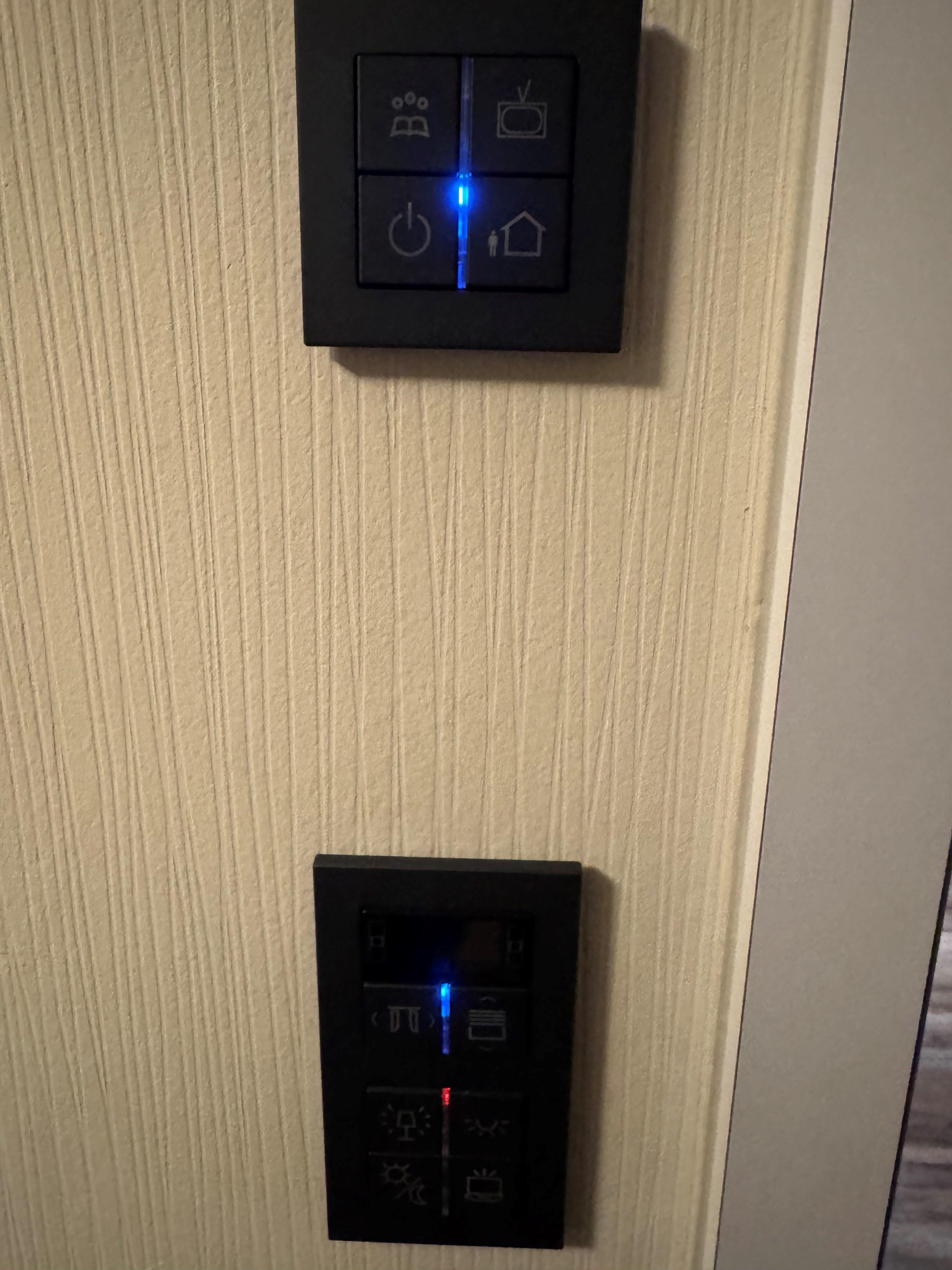 It's difficult to know which of the ten buttons to press in a dark room to turn the lights on.