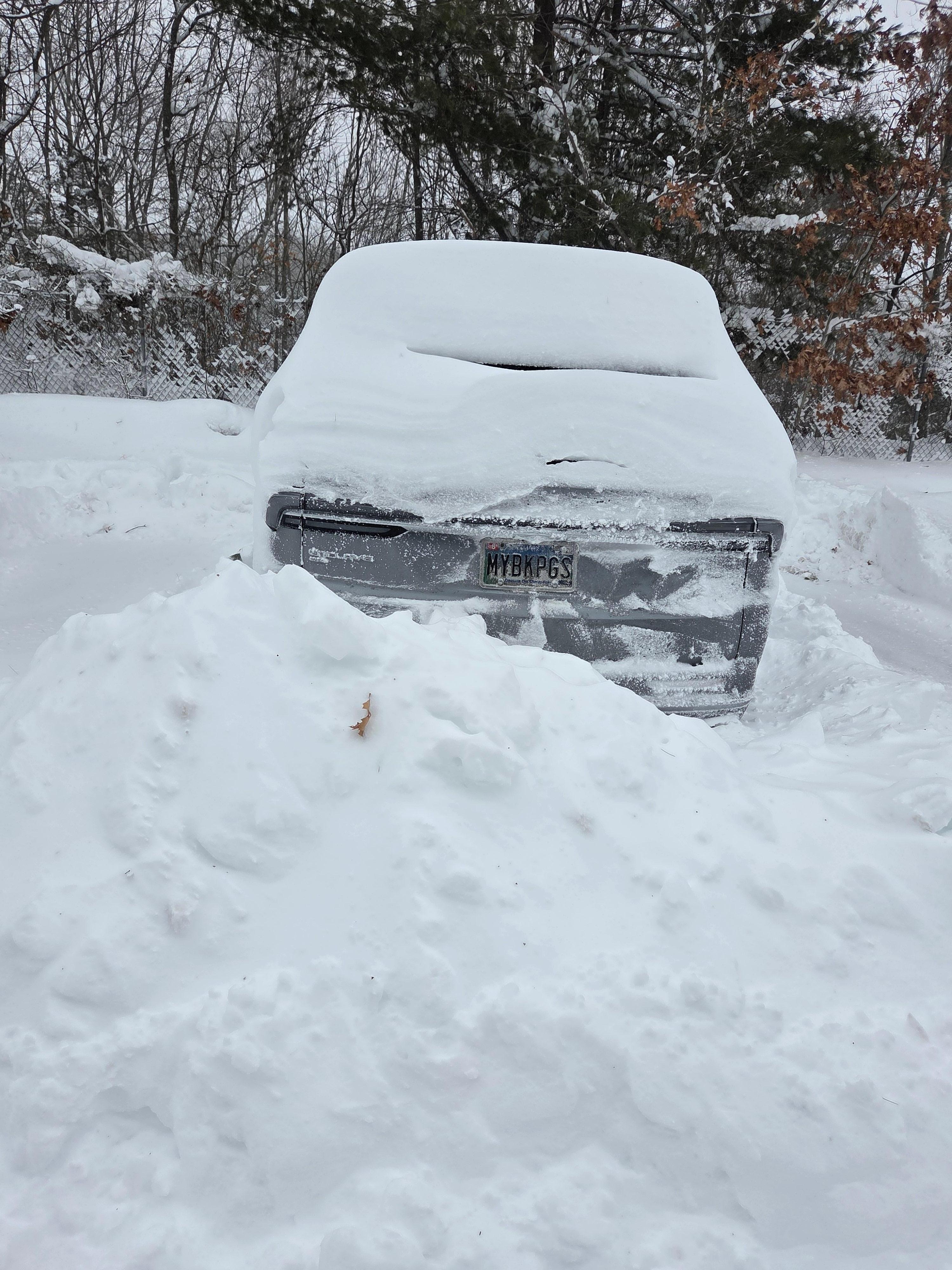 Here's picture of my car after my "neighbor" decided to shovel his snow to the back of mine. 