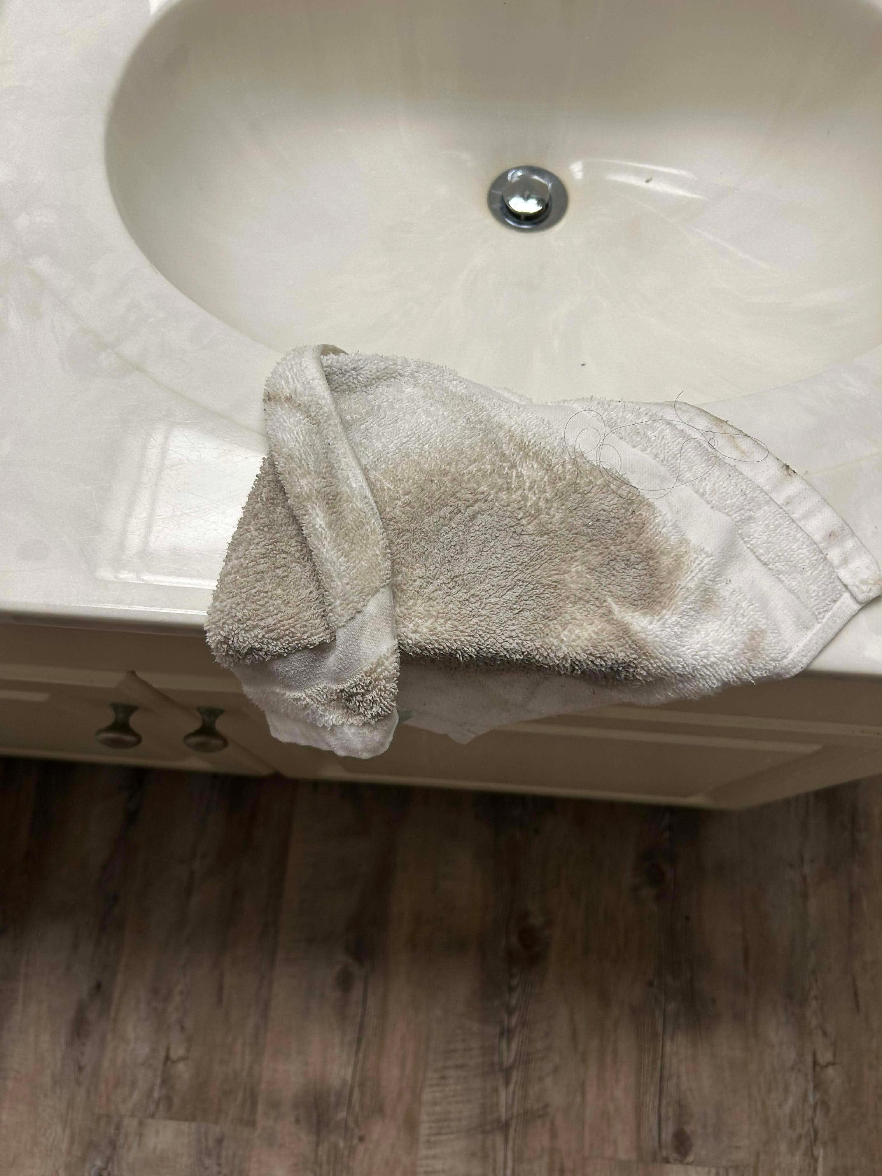 Bathroom floor was cleaned with this rag. Both sides filthy. This was on check in day. 