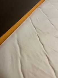 The bed covering had spots all over it.