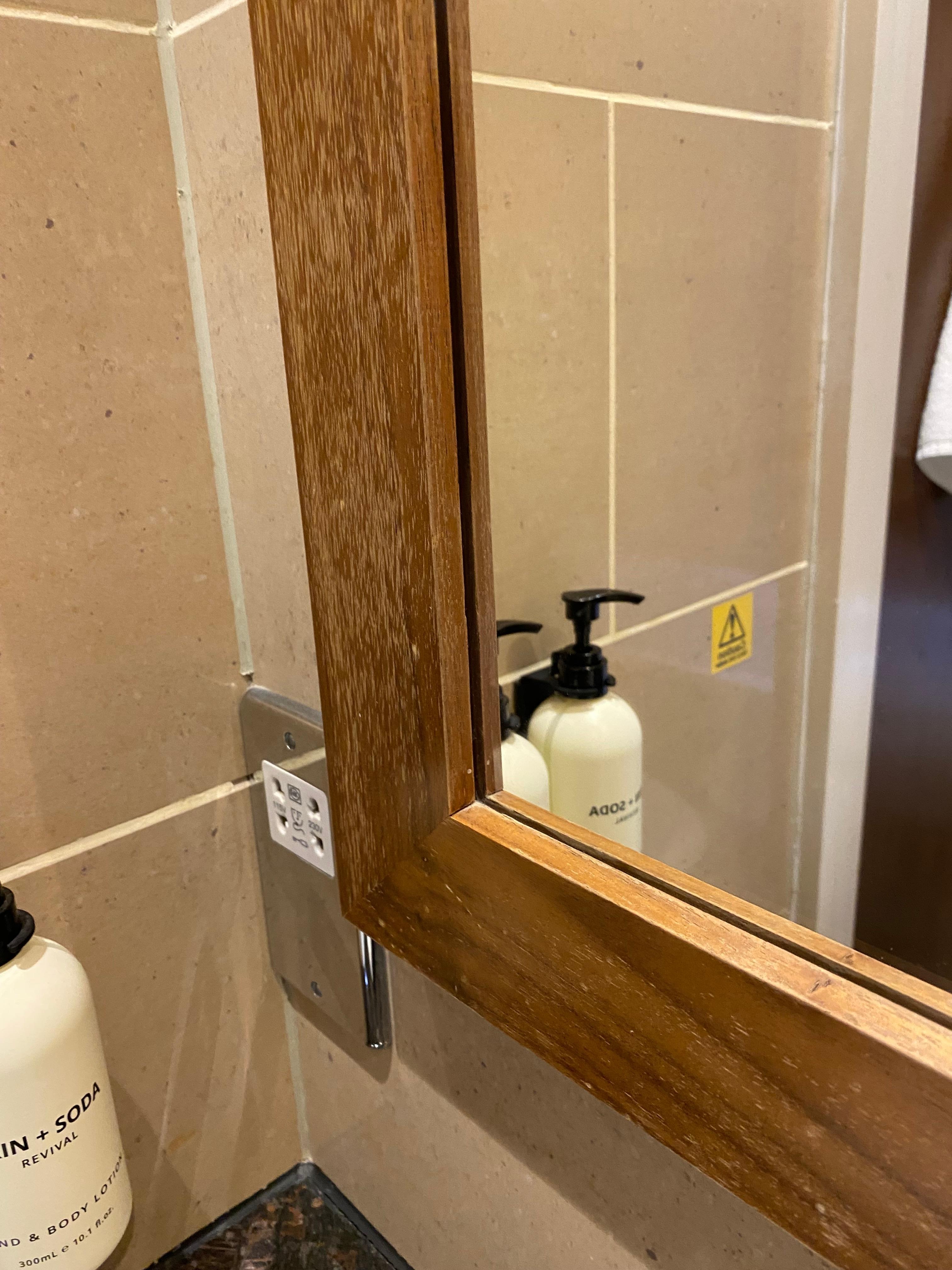 Water damaged mirror surround 