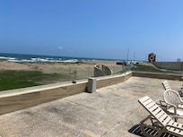 Acceso y vista a la playa