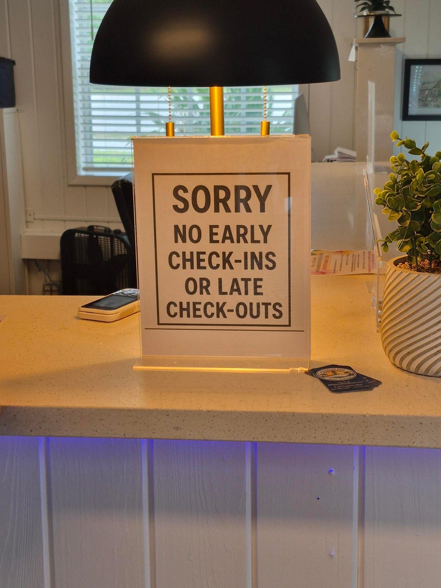 A VERY UNWELCOMING sign will greet you at check in. And the clerk seemed to not want to get out of his chair.