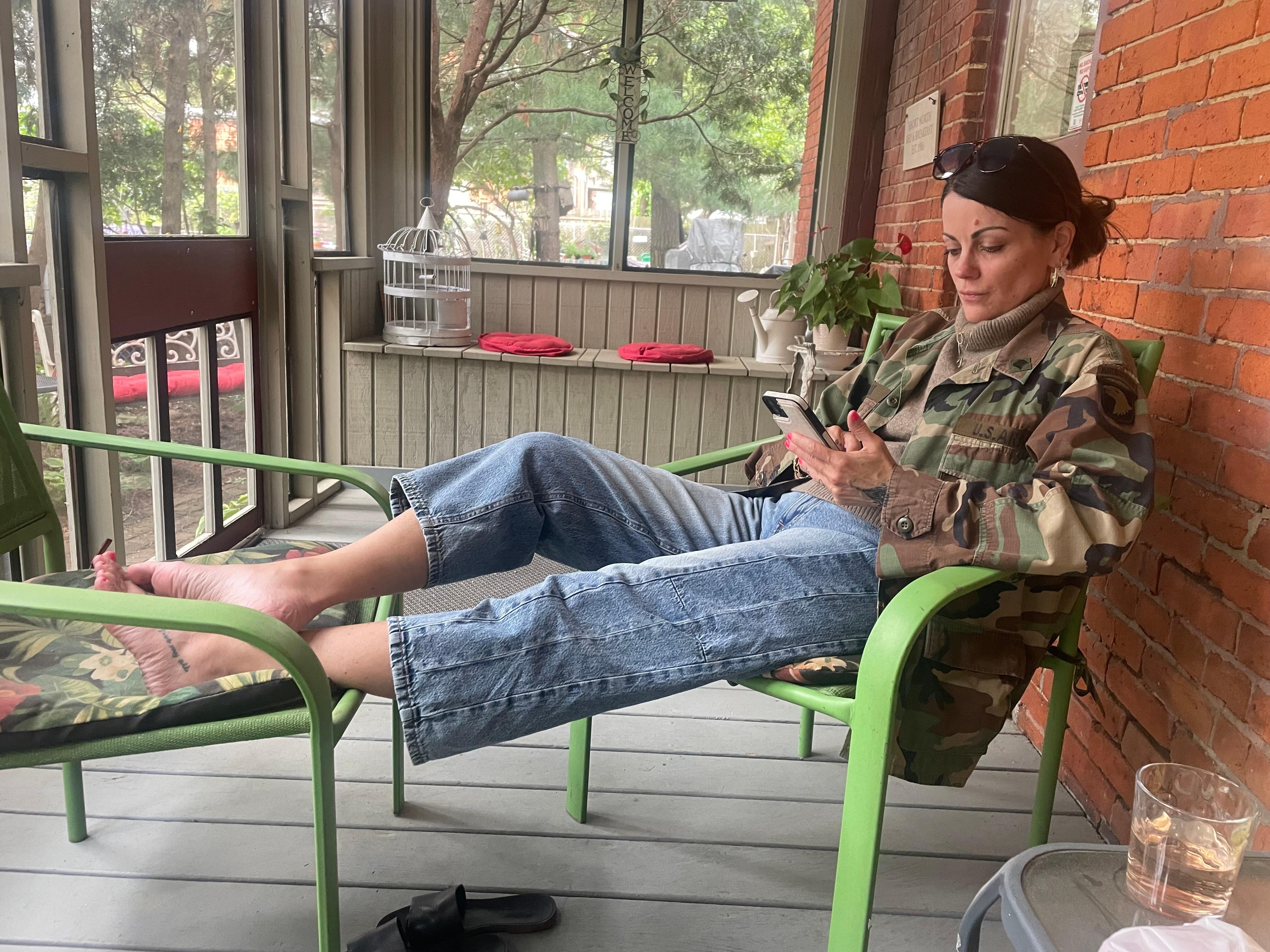 Relaxing on the screened in porch 